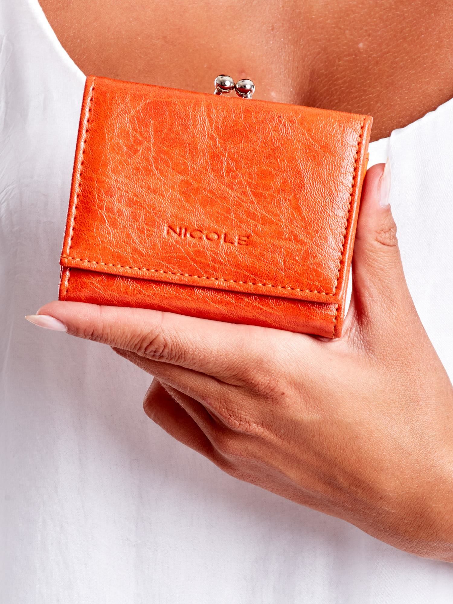 Orange wallet made of ecological leather with earwires