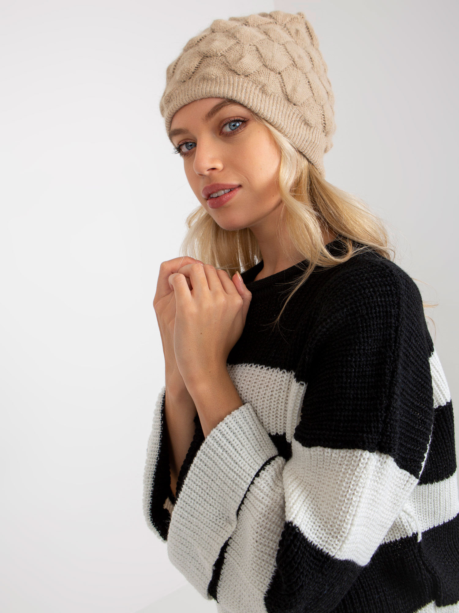 Lady's beige knitted winter cap