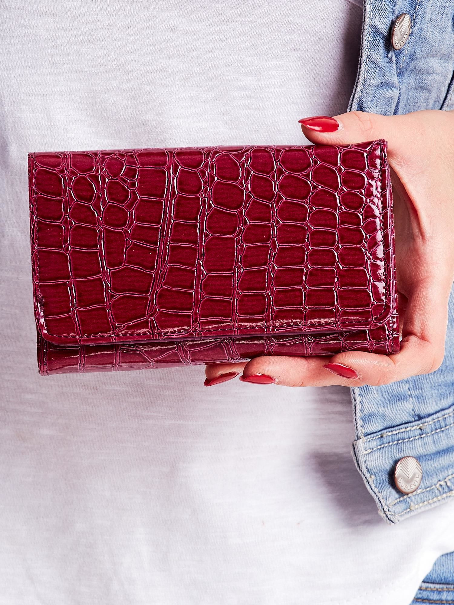 Plum wallet with animal skin embossing